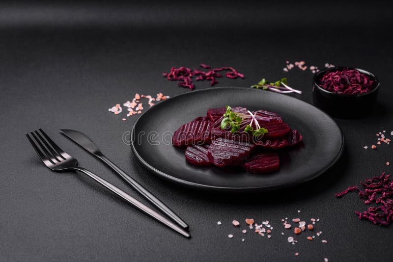 Delicious Healthy Boiled Ruby-colored Beets Sliced ??on a Black Plate ...
