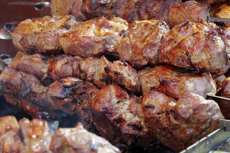 Delicious Hot Kebabs. Shish Kebabs Broils in Barbecue Stock Photo ...