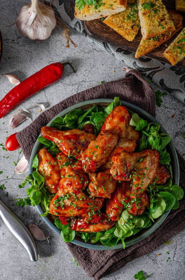 Delicious Hot Wings with Chilli and Garlic Stock Image - Image of ...