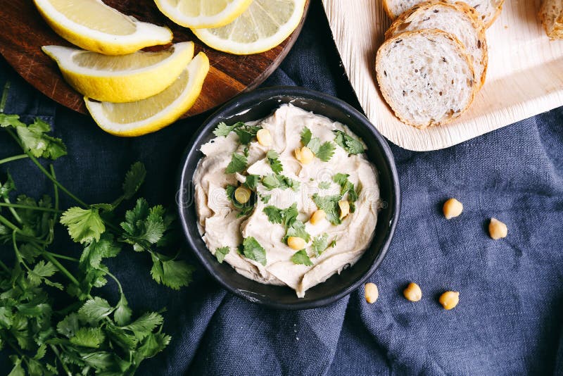 Delicious hummus stock image. Image of bread, breakfast - 49777739
