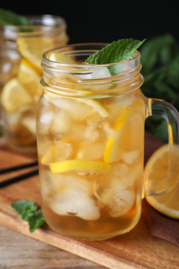 Delicious Iced Tea in Mason Jar on Wooden Table Stock Image - Image of ...