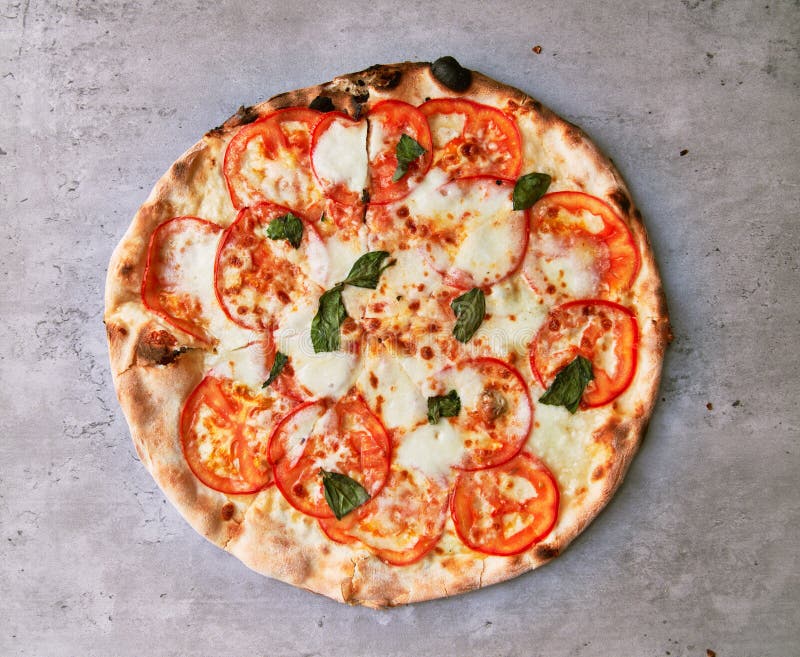 Delicious Italian Pizza on a Concrete Surface Stock Image - Image of ...