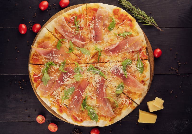 Delicious Italian Pizza with Parma Ham and Rocket Stock Image - Image ...