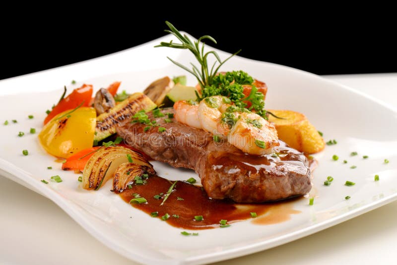 Delicious Juicy Barbequed Steak and Prawn Stock Image - Image of drink ...