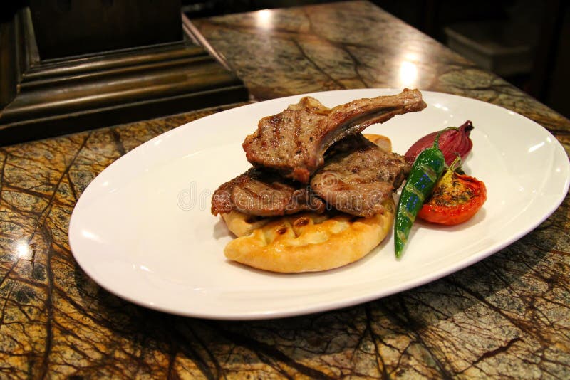 Delicious lamp chops stock photo. Image of beef, plate - 54644364