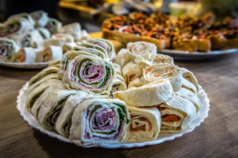 Delicious Lavash Roll with Red Fish, Cheese, Ham and Spinach on Kitchen ...