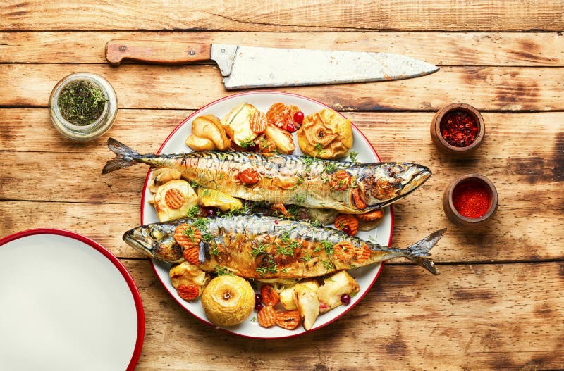 Baked fish with apple stock photo. Image of estragon - 203658920
