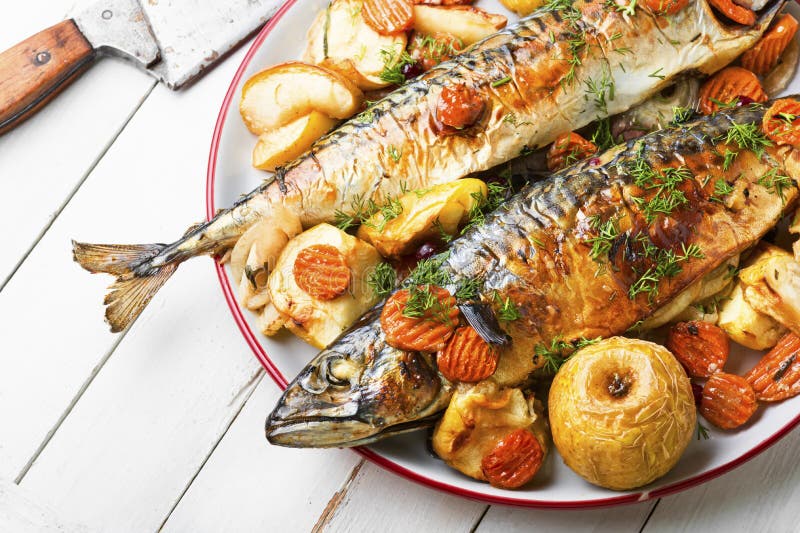 Baked fish with apple stock image. Image of knife, fried - 203181375