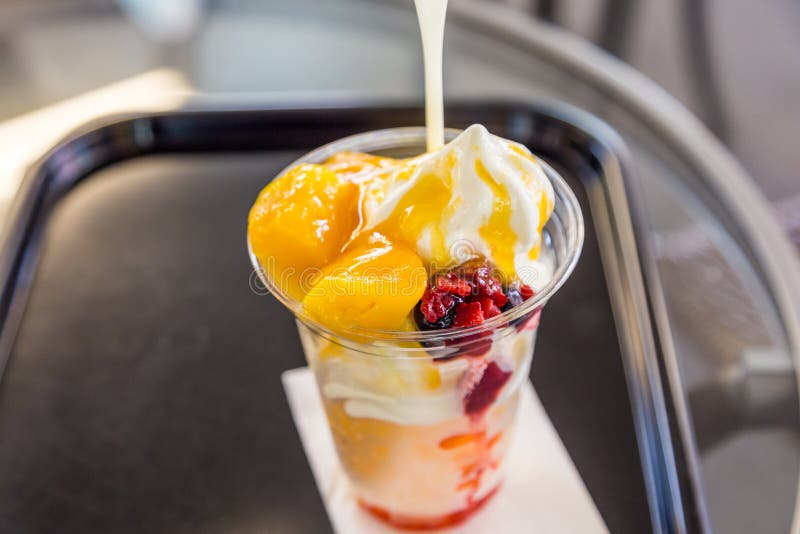 Mango Sundae stock image. Image of redcurrant, glass - 10918629
