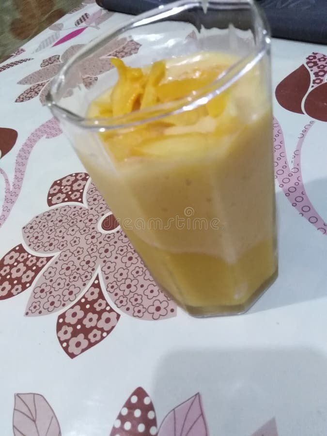 Delicious Mango Milk Shake stock photo. Image of cocktail - 180125470