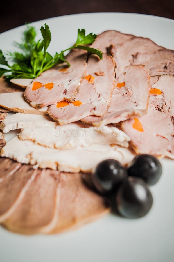 Meat cold cuts with olives stock photo. Image of food - 177693828
