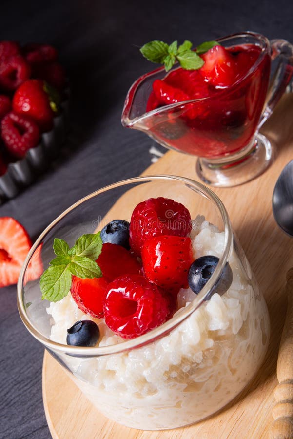 Delicious Milk Rice with Different Berries and Red Fruit Jelly Stock ...