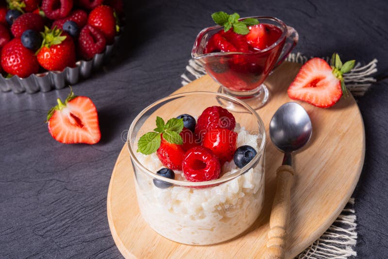 Delicious Milk Rice with Different Berries and Red Fruit Jelly Stock ...