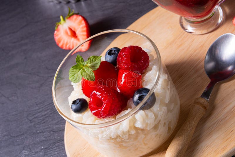 Delicious Milk Rice with Different Berries and Red Fruit Jelly Stock ...