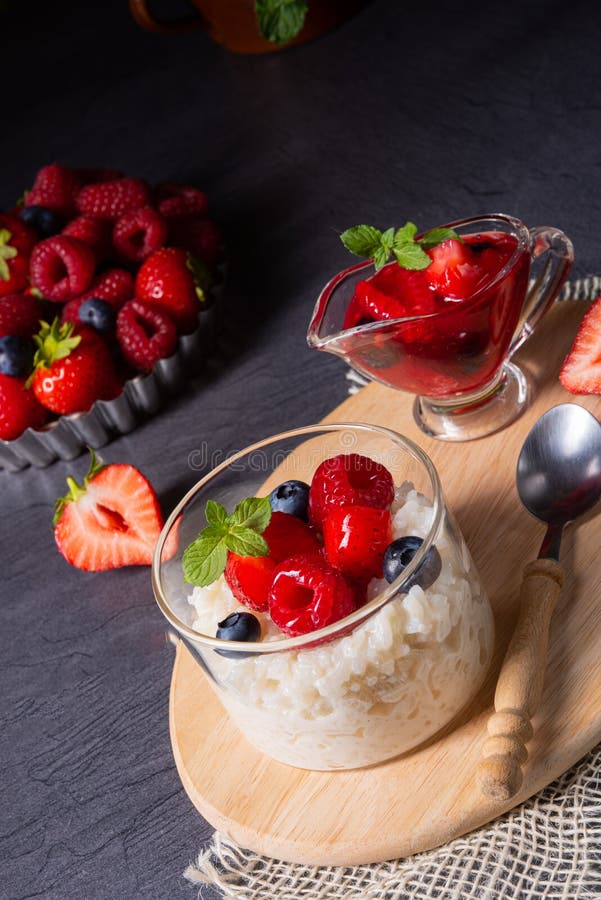 Delicious Milk Rice with Different Berries and Red Fruit Jelly Stock ...