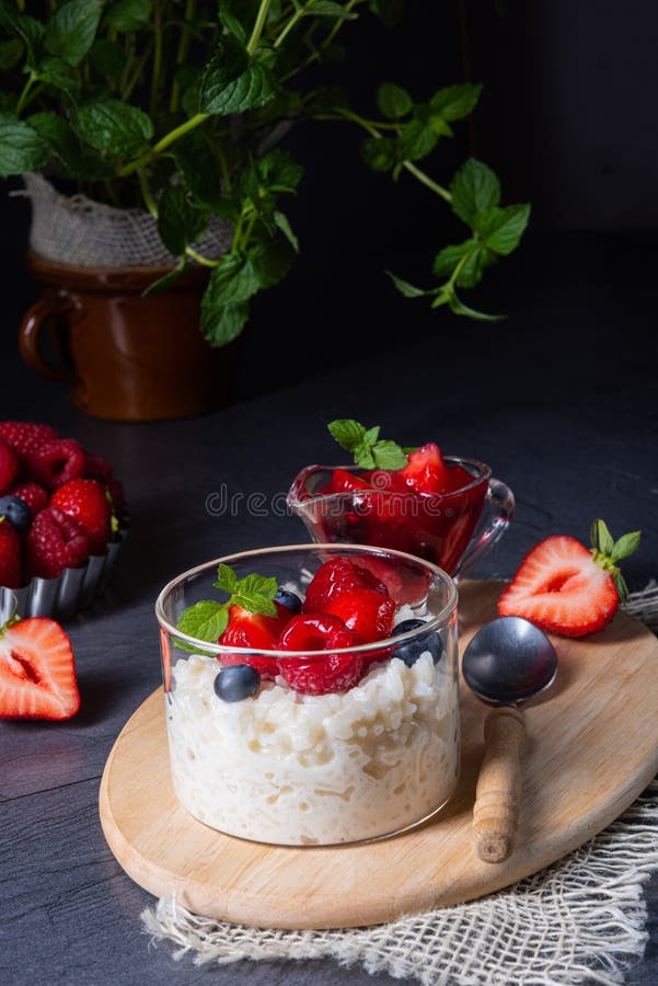 Delicious Milk Rice with Different Berries and Red Fruit Jelly Stock ...