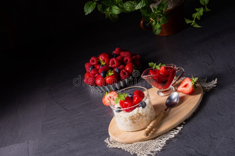 Delicious Milk Rice with Different Berries and Red Fruit Jelly Stock ...