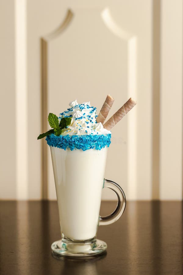 Delicious Milkshakes on Wooden Table. Copy Space. Stock Image - Image ...