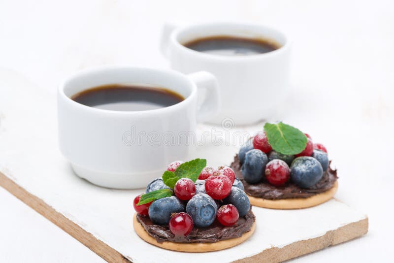 Delicious Mini Cakes with Chocolate Cream and Berries Stock Photo ...