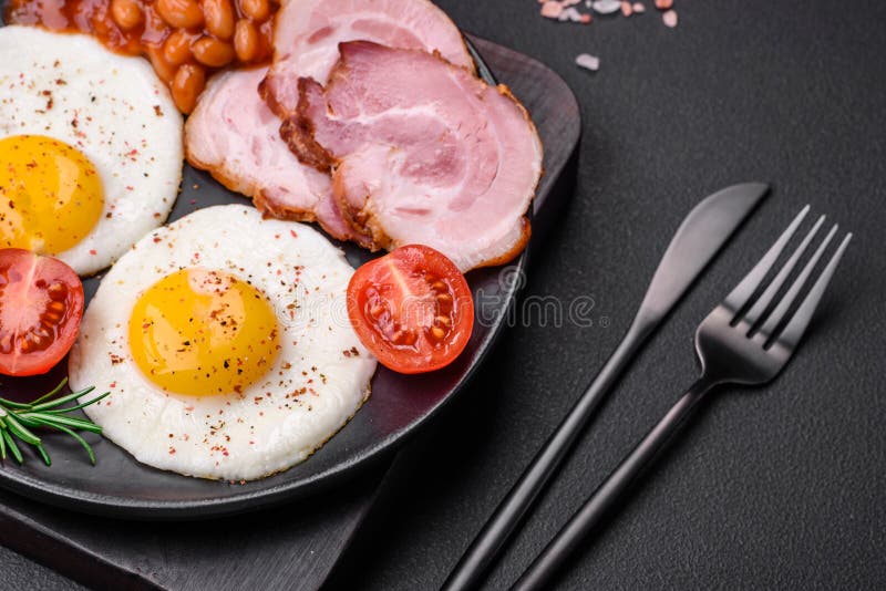 Delicious Nutritious English Breakfast with Fried Eggs and Tomatoes ...
