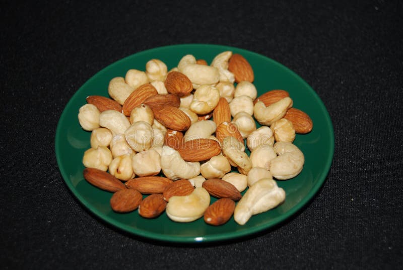 Delicious Nuts on a Saucer. Stock Photo - Image of muesli, delicacy ...