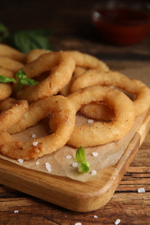 Delicious Onion Rings on Wooden Table Stock Image - Image of golden ...