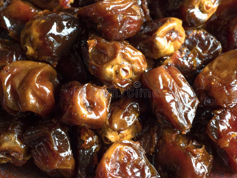 Delicious Organic Sweet Dates in Bowl with Syrup. Stock Image - Image ...