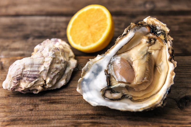 Delicious Oyster with Lemon Stock Image - Image of ocean, drink: 145927549