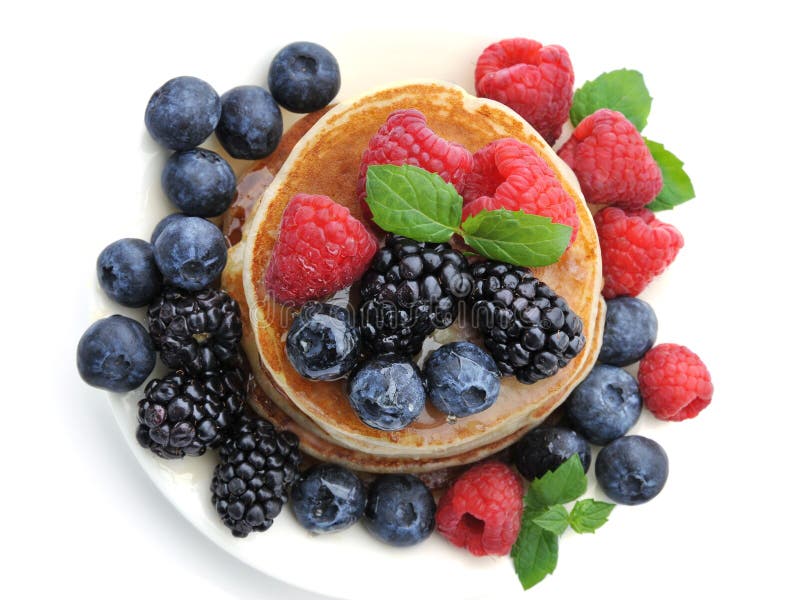 Delicious Pancakes with Berries and Honey on a White Wooden Board Stock ...