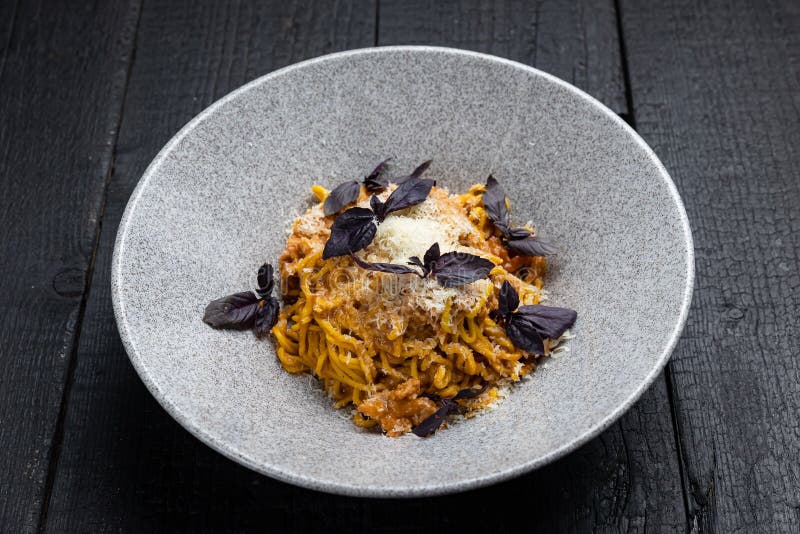 Delicious Pasta on a Dark Table in a Restaurant Stock Photo - Image of ...