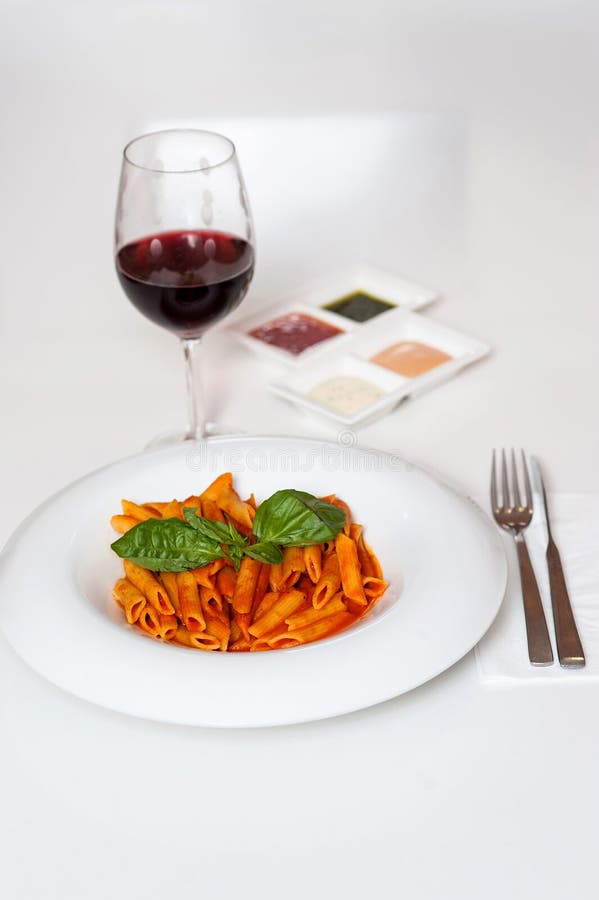 Delicious Pasta and Red Wine Served for Dinner Stock Photo - Image of ...