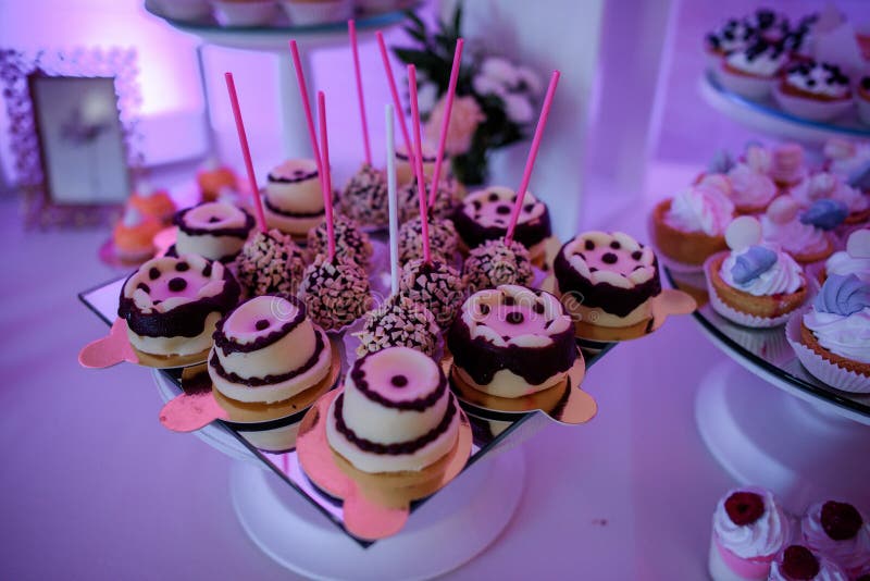 Delicious Pastry with Cream Served on Candy Bar Stock Image - Image of ...