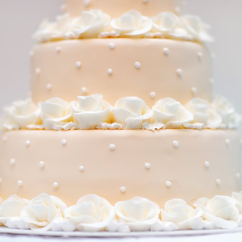 Delicious Peach and White Wedding Cake Stock Photo - Image of peach ...