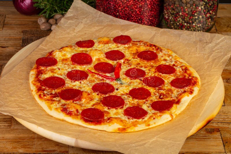 Delicious peperoni pizza stock photo. Image of table - 120136134