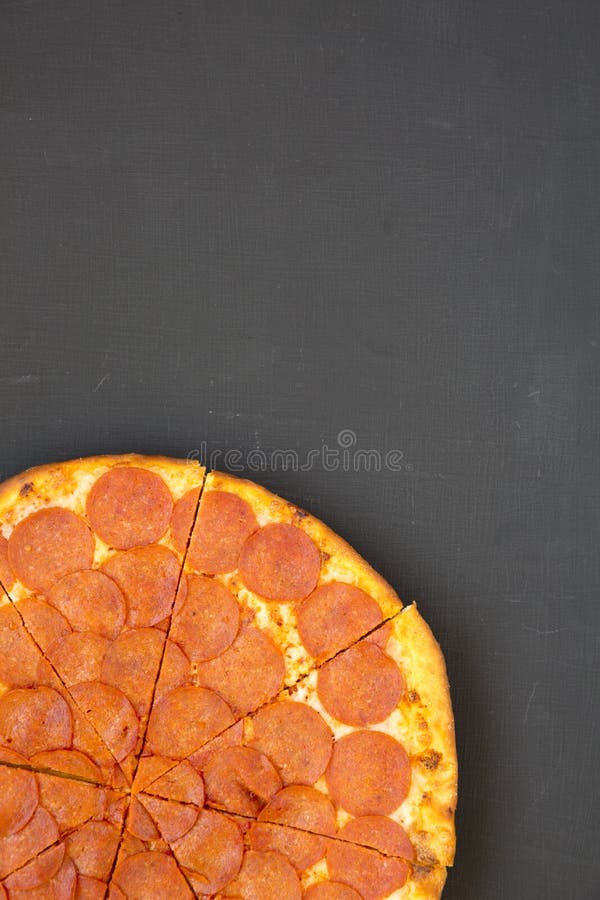 Delicious Pepperoni Pizza Over Black Surface, Top View. Overhead, from ...