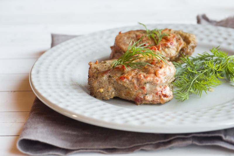 Delicious Pieces of Baked Meat with Fresh Vegetables on the Table Stock ...