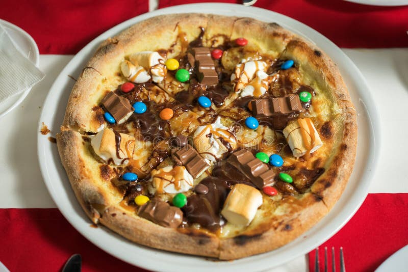 Delicious Pizza with Chocolate Stock Photo - Image of bowl, concrete ...