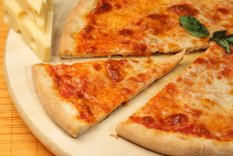 Delicious Pizza on Wooden Plate Stock Image - Image of great, gourmet ...