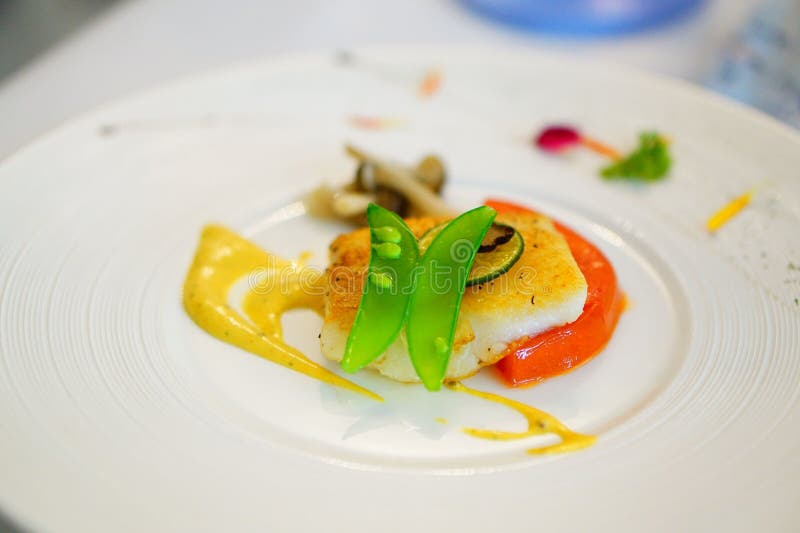 Delicious Plate of Pasta Topped with a Single, Ripe Tomato Stock Photo ...