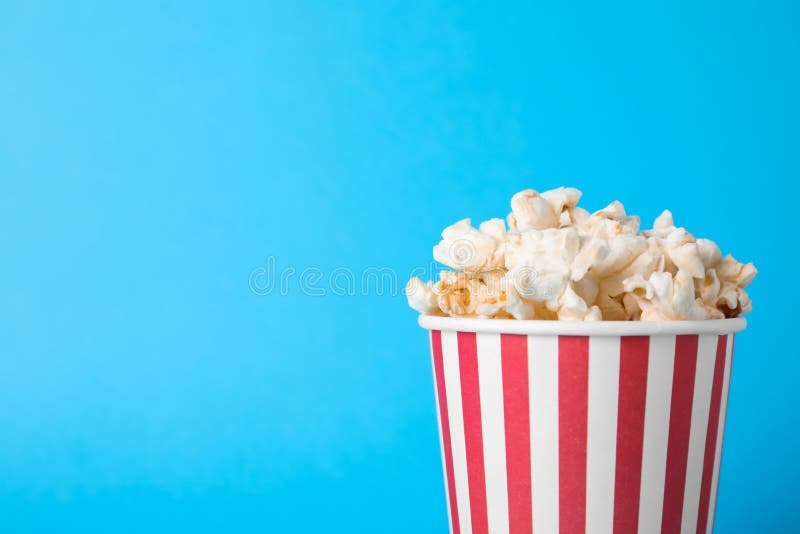 Delicious Popcorn on Light Blue Background, Closeup. Space for Text ...
