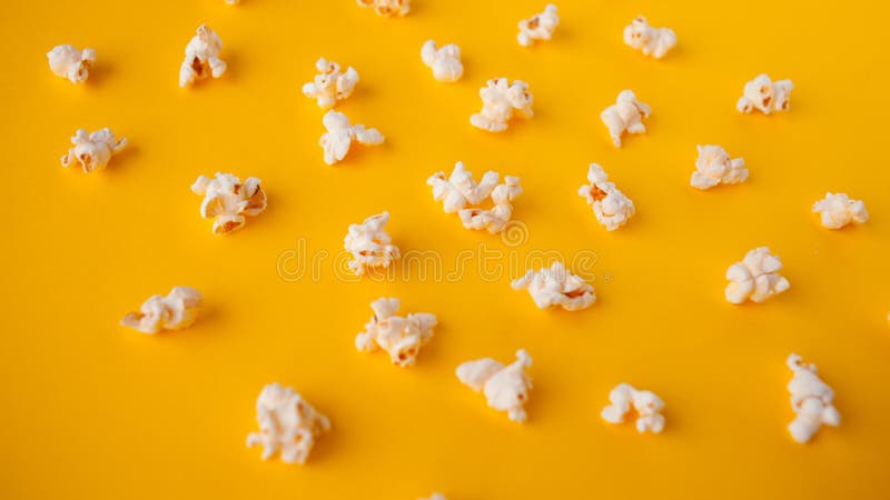 Delicious Popcorn Scattered on a Yellow Background Stock Image - Image ...