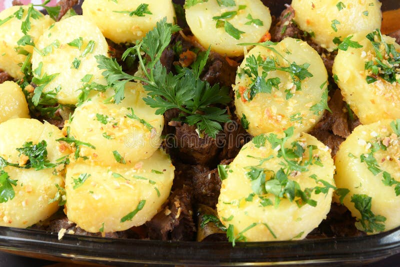 Delicious Portion of Lamb, Beef Cooked with Potatoes and Fine Herbs ...