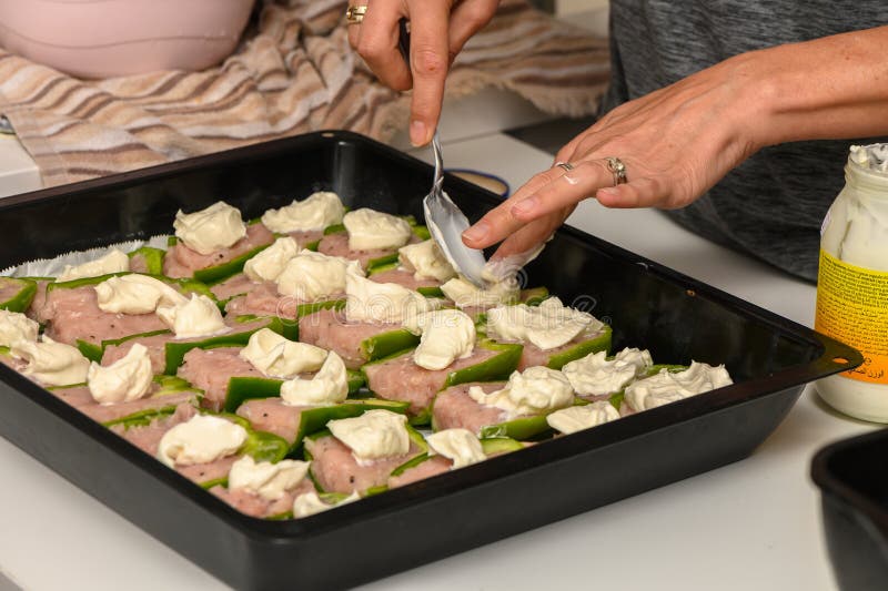 Delicious Preparation of Savory Stuffed Peppers with Creamy Topping in ...