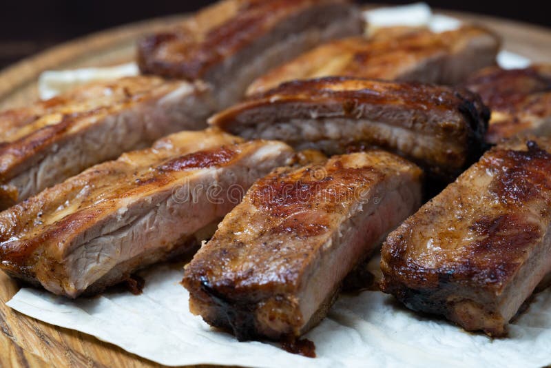 Delicious Ribs with Sauce on a Wooden Board Stock Photo - Image of ...