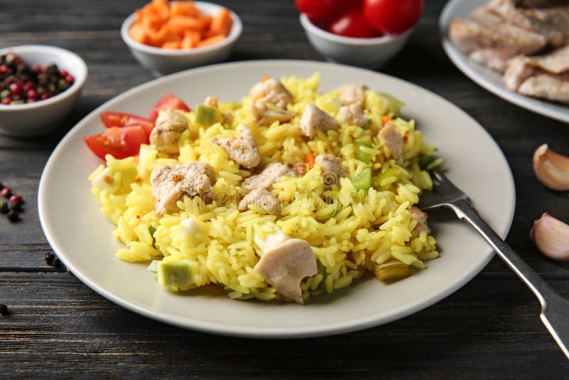 Delicious Rice with Meat and Vegetables on Plate Stock Image - Image of ...