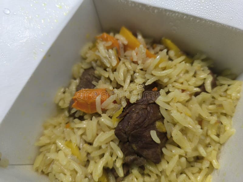 Delicious Rice Pilaf with Meat in a Cardboard Box Stock Image - Image ...