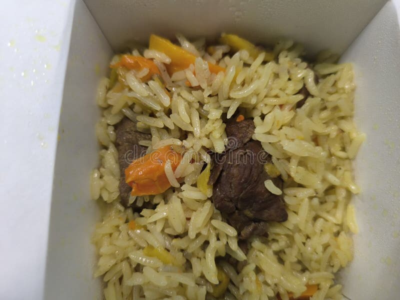 Delicious Rice Pilaf with Meat in a Cardboard Box Stock Image - Image ...