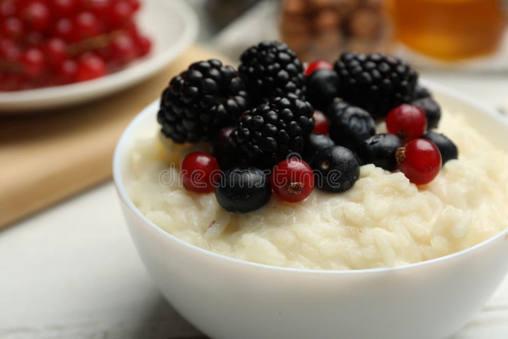 Delicious Rice Pudding with Berries, Closeup View Stock Image - Image ...