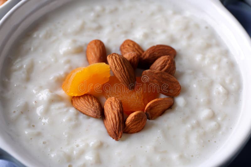 Delicious Rice Pudding with Dried Apricots and Almonds in Casserole ...