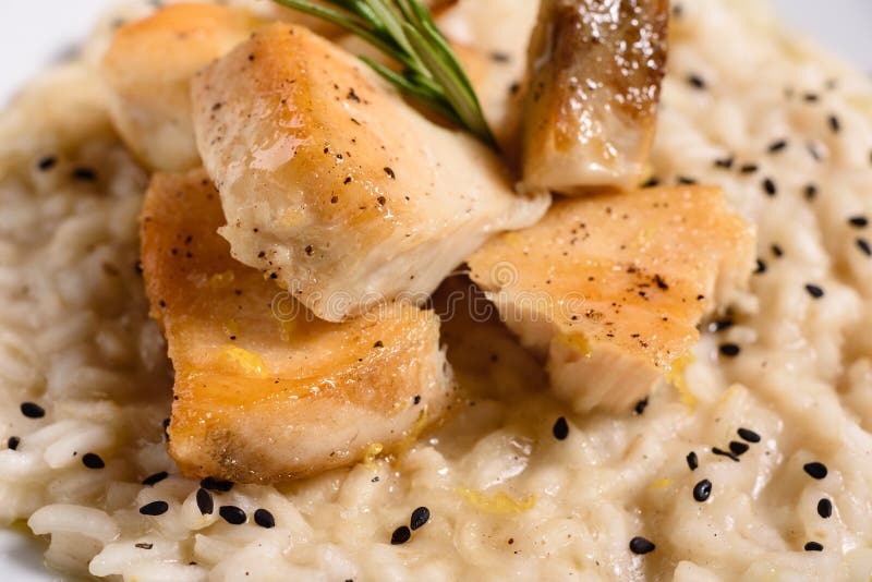 Delicious Risotto with Roasted Pieces of Chicken Fillet Stock Photo ...